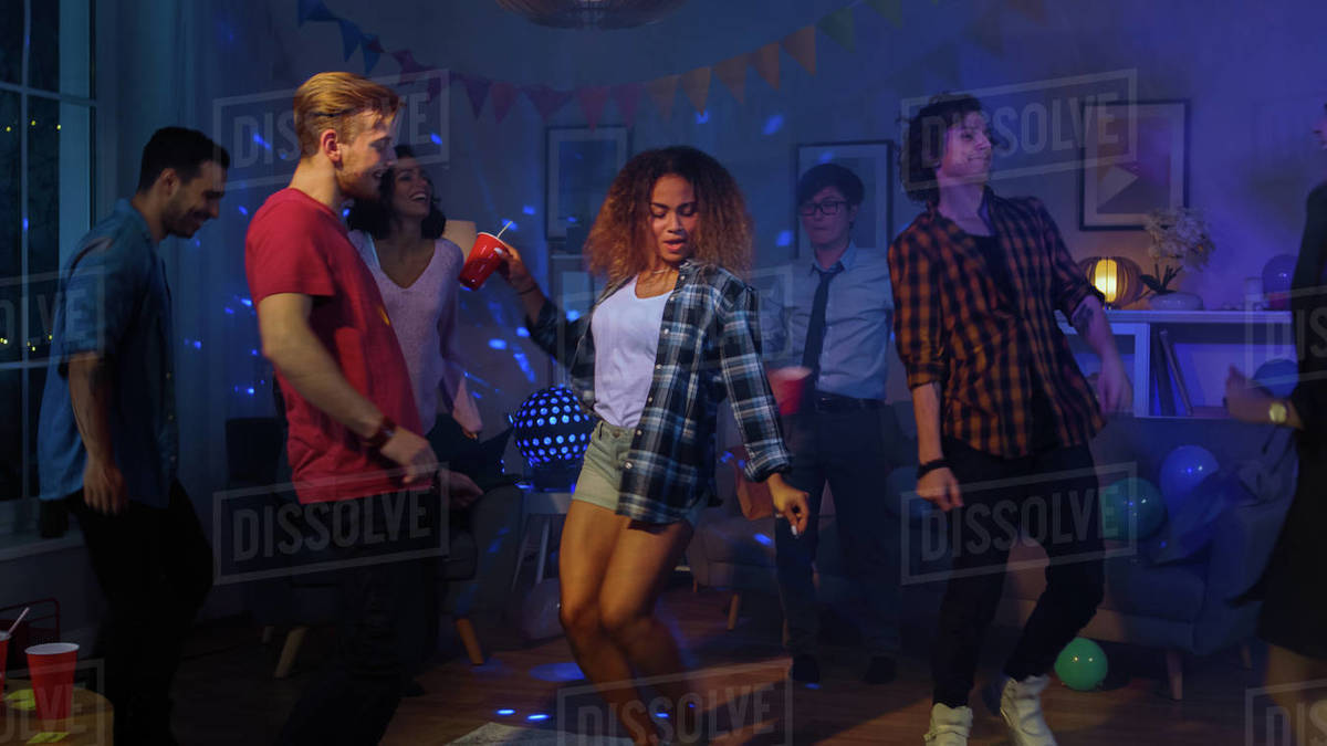 Friends dance together at a college party. - Royalty-free Stock Photo ...