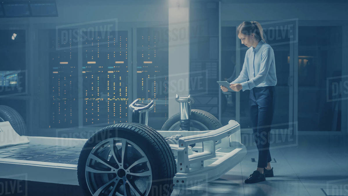 Automobile Engineer Working on Electric Car Chassis Platform, Using ...