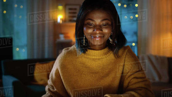 Portrait of Beautiful Black Girl Working on a Laptop while Sitting at ...
