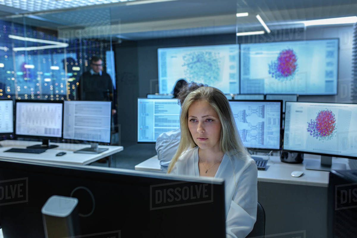 Female Computer Engineer Works on a Neural Network/ Artificial ...