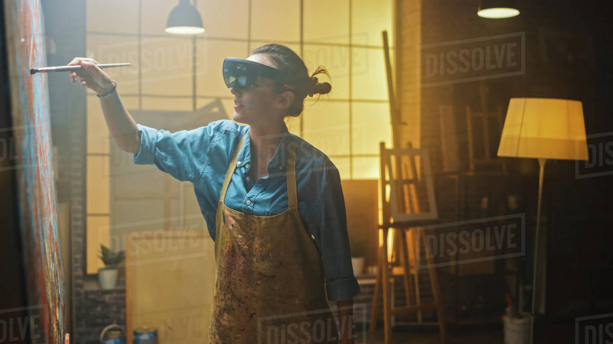 Talented Female Artist Wearing Augmented Reality Headset Working on ...