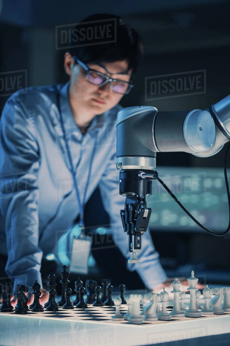 Vertical Shot of a Professional Japanese Development Engineer Testing ...