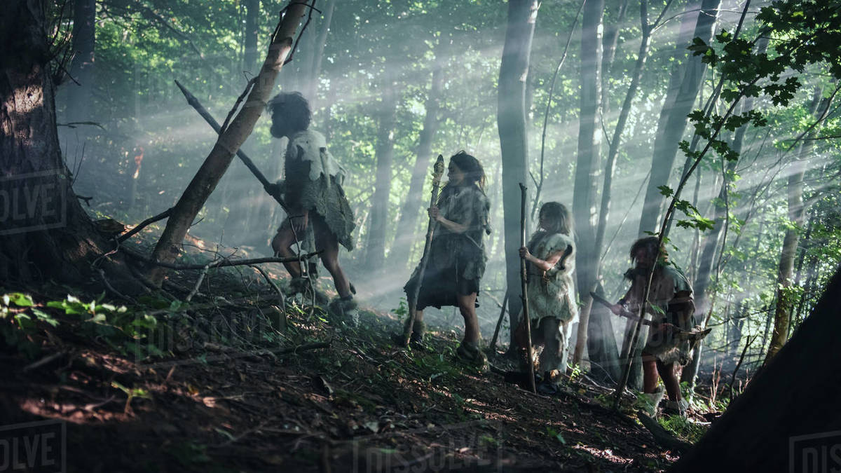 Tribe of Hunter-Gatherers Wearing Animal Skin Holding Stone Tipped ...