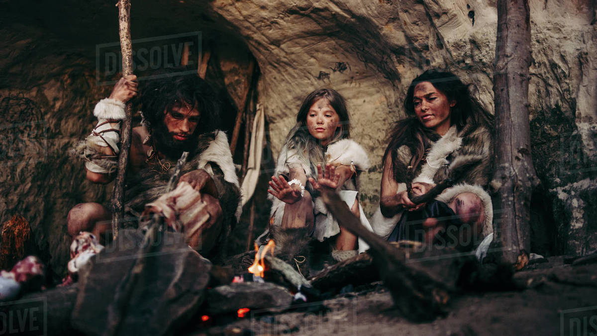 Tribe of Prehistoric PrimitiveHunter-Gatherers Wearing Animal Skins ...