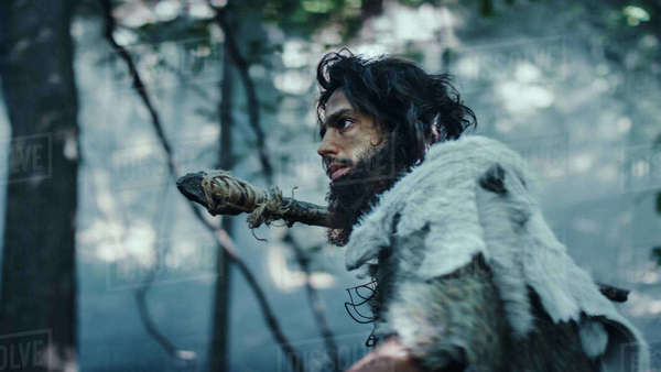 Primeval Caveman Wearing Animal Skin Holds Stone Tipped Spear Looks ...