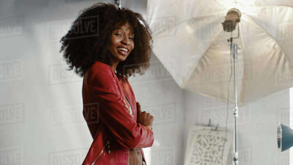 Beautiful Black Model Posing for a Photographer, he Takes Pictures with ...