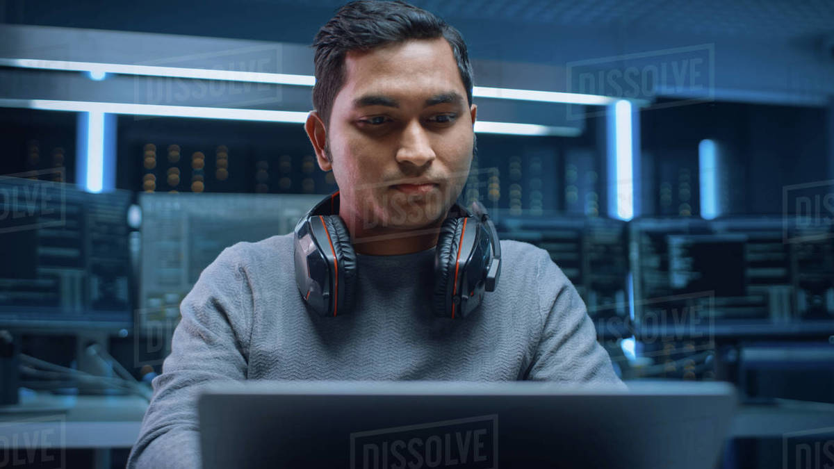 Portrait of Software Developer / Hacker / Programmer Sitting at His ...