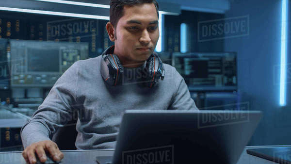 Portrait of Software Developer / Hacker / Programmer Sitting at His ...