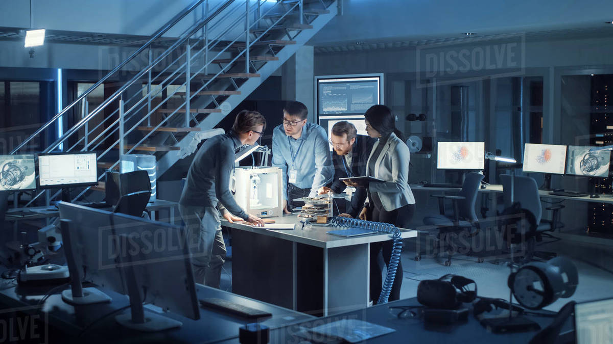 Diverse Team of Electronics Development Engineers Standing at the Desk ...