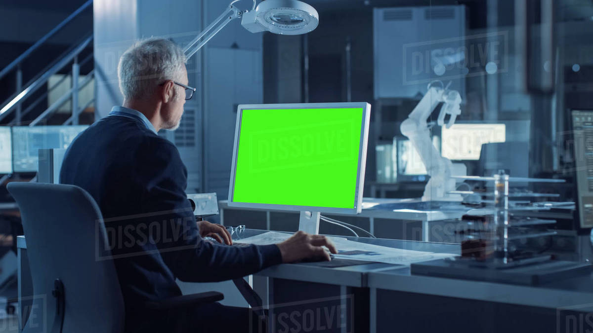 Professional Heavy Industry Engineer Works on Green Mock-up Screen ...