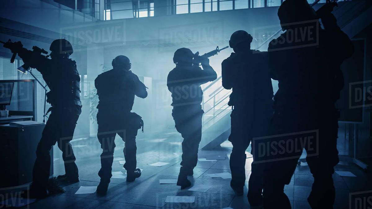 Close Up Portraits of Masked Squad of Armed SWAT Police Officers Storm ...