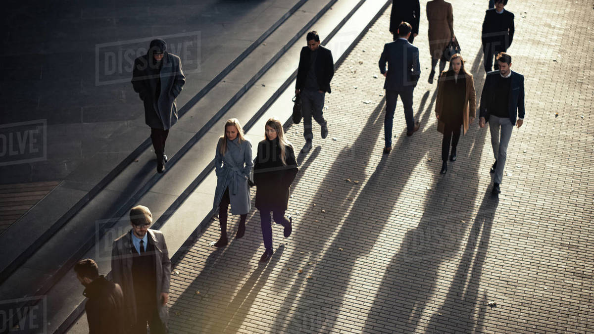 High Angle Shot of Office Managers and Business People Commuting to ...
