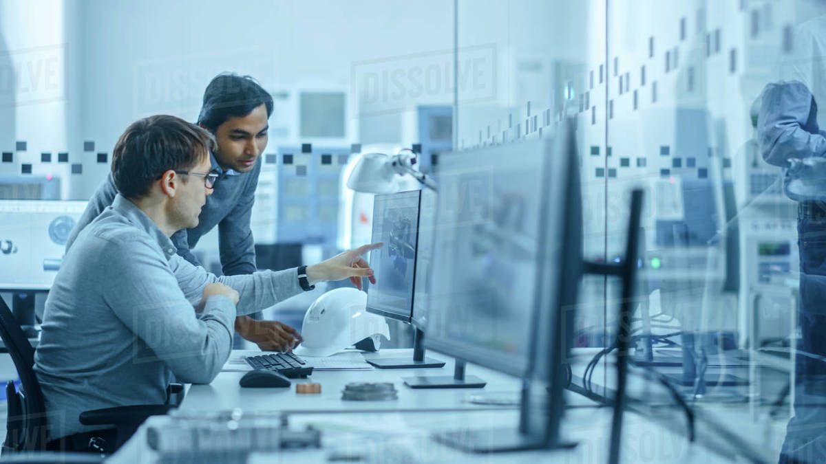 Inside Office: Digital Engineering Professional Working on Personal ...