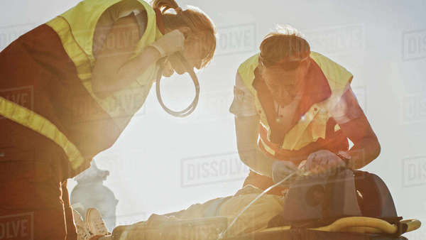 On the Car Crash Traffic Accident Scene: Paramedics Saving Life of a ...