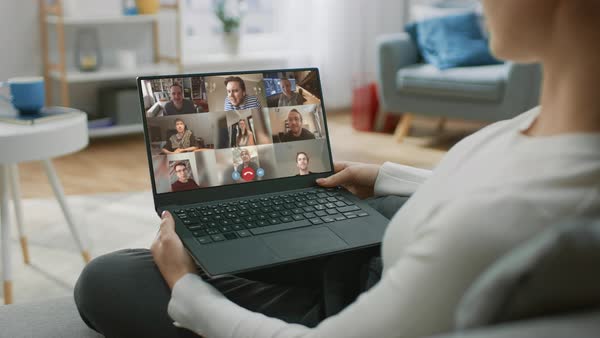 Home Office: Woman Uses Laptop Computer with Conference Video Call App ...
