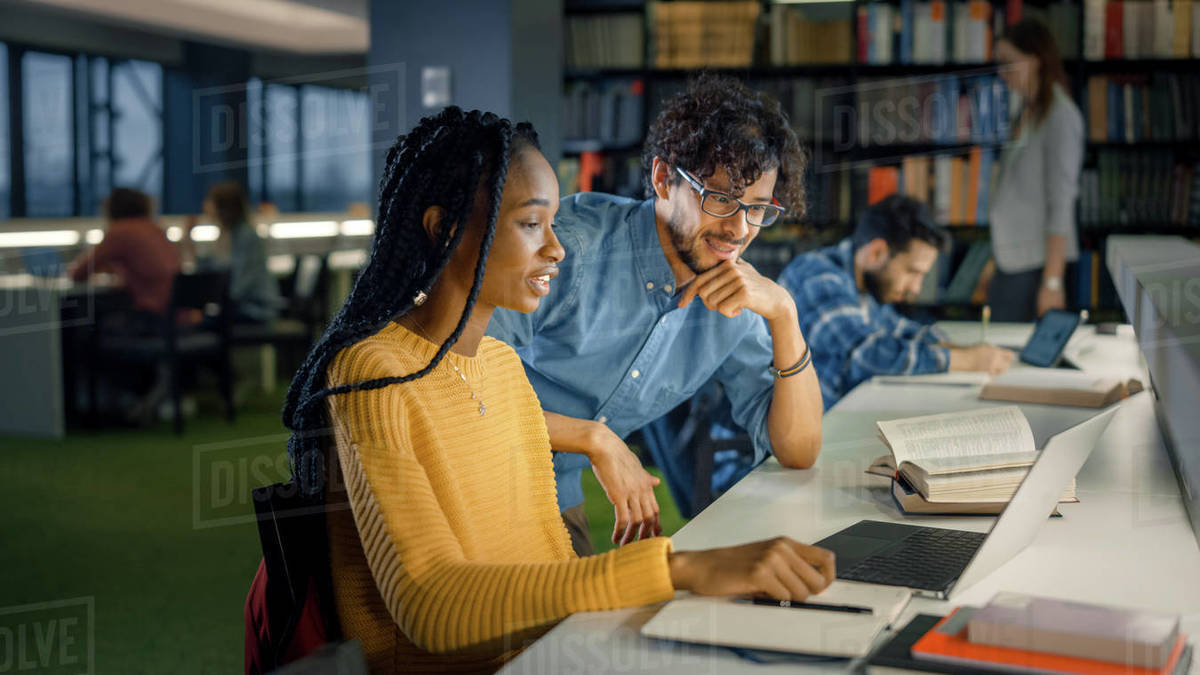 University Library: Gifted Girl uses Laptop, Smart Classmate Explains ...