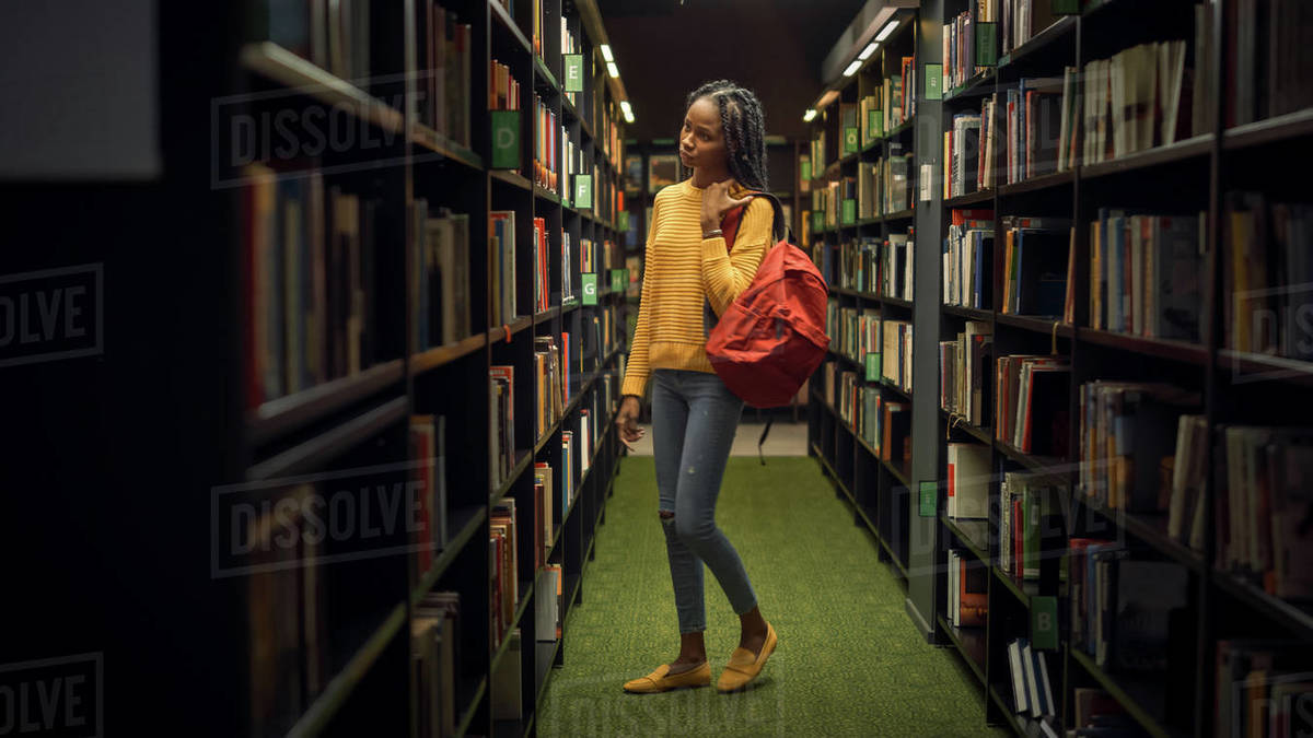 University Library: Portrait of Gifted Beautiful Girl Stands Between ...