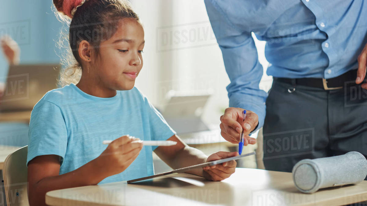 Elementary School Computer Science Class: Smart Girl Uses Digital ...