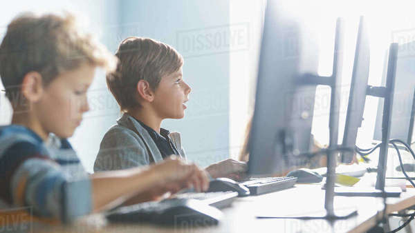 Elementary School Computer Science Classroom: Smart Little Schoolboy ...