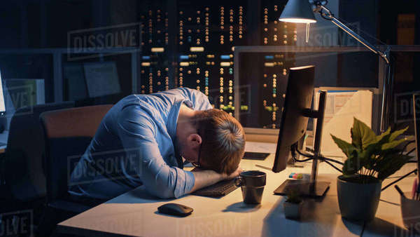 In the Office at Night, Overworked Tired Office Worker Fell Asleep at ...