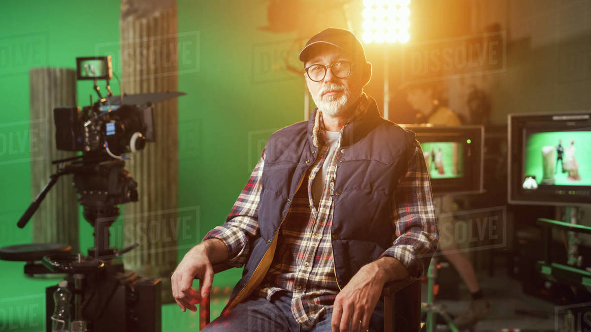 Protrait of Prominent Successful Senior Director Sitting in a Chair on ...