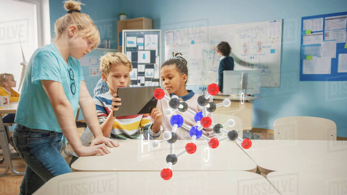 Three Diverse School Children in Chemistry Science Class Use Digital ...
