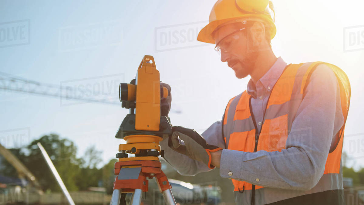 Construction Worker Using Theodolite Surveying Optical Instrument for ...