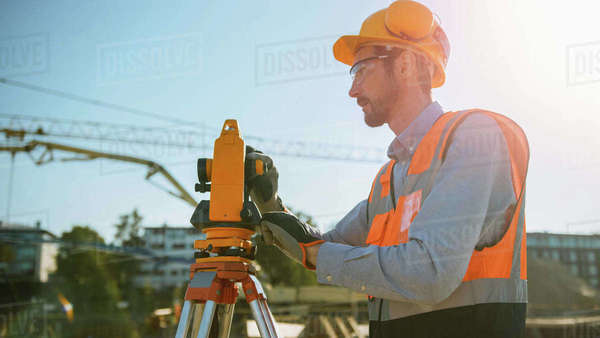 Construction Worker Using Theodolite Surveying Optical Instrument for ...