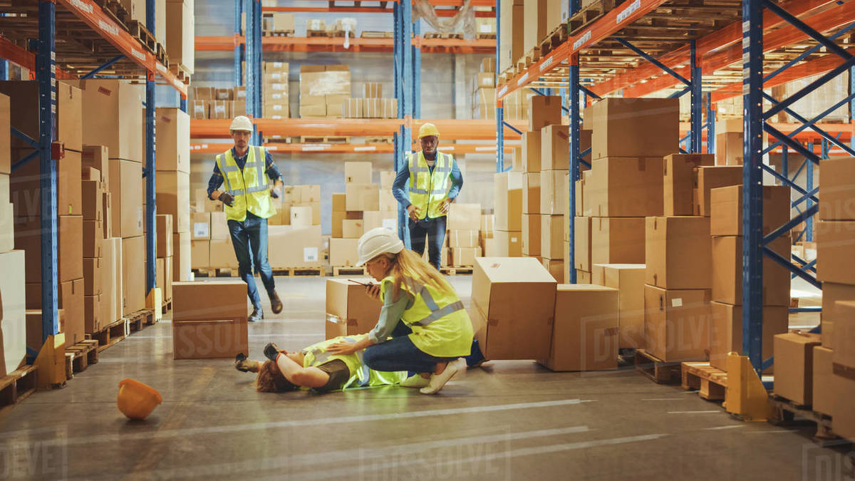 Warehouse Worker Has Work Related Accident Falls while Trying to Pick ...
