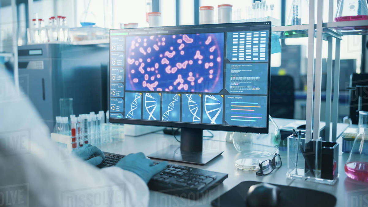 Microbiology Scientist Typing on Keyboard on Computer - Royalty-free ...