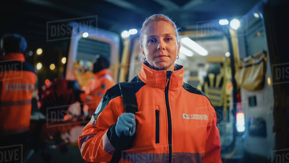 Female Paramedic Proudly Standing - Royalty-free Stock Photo | Dissolve