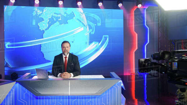 Live News Studio with Professional Anchor doing Report - Stock Photo ...