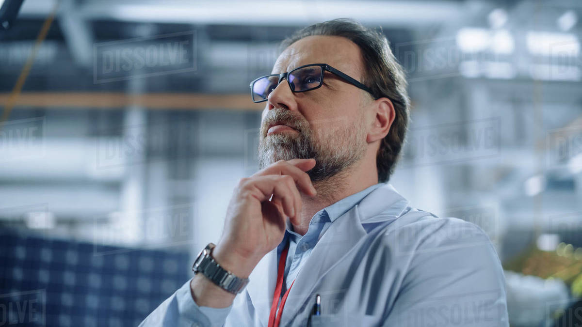 Portrait of Mature Male Engineer Confident and Focused Thinking ...