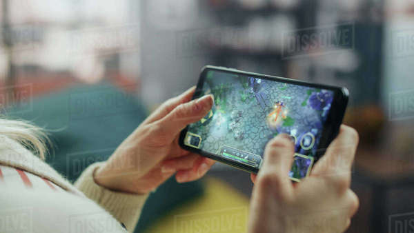 Close Up on Hands Playing an RPG Strategy Video Game on a Horizontally ...