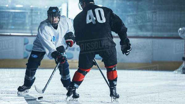 Ice Hockey Rink Arena: Two Professional Players From Different Teams ...