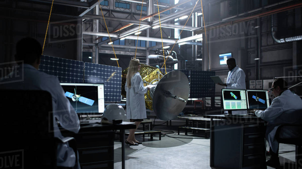 Engineer and Technician Working on Satellite Construction. Aerospace ...