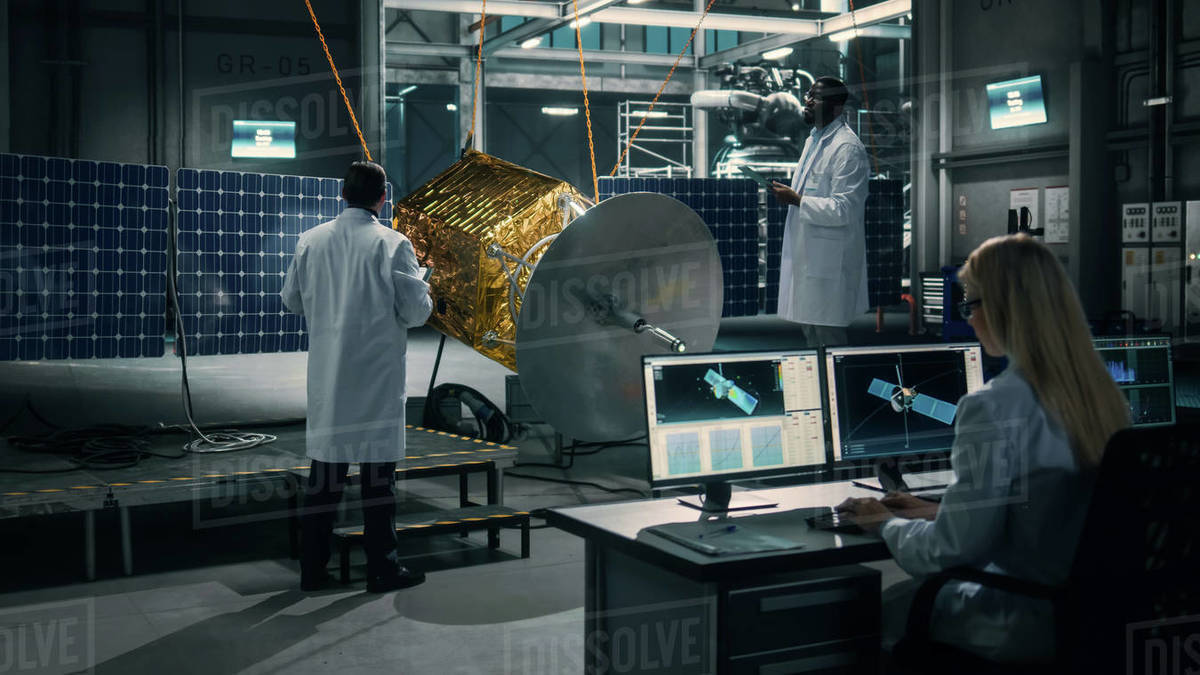 Team of Engineers Working on Satellite Construction. Aerospace Agency ...