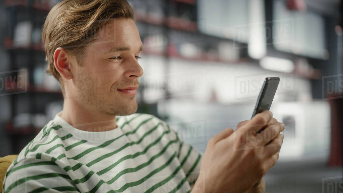 Sunny Day: Portrait of Happy Handsome White Man Using Smartphone in ...