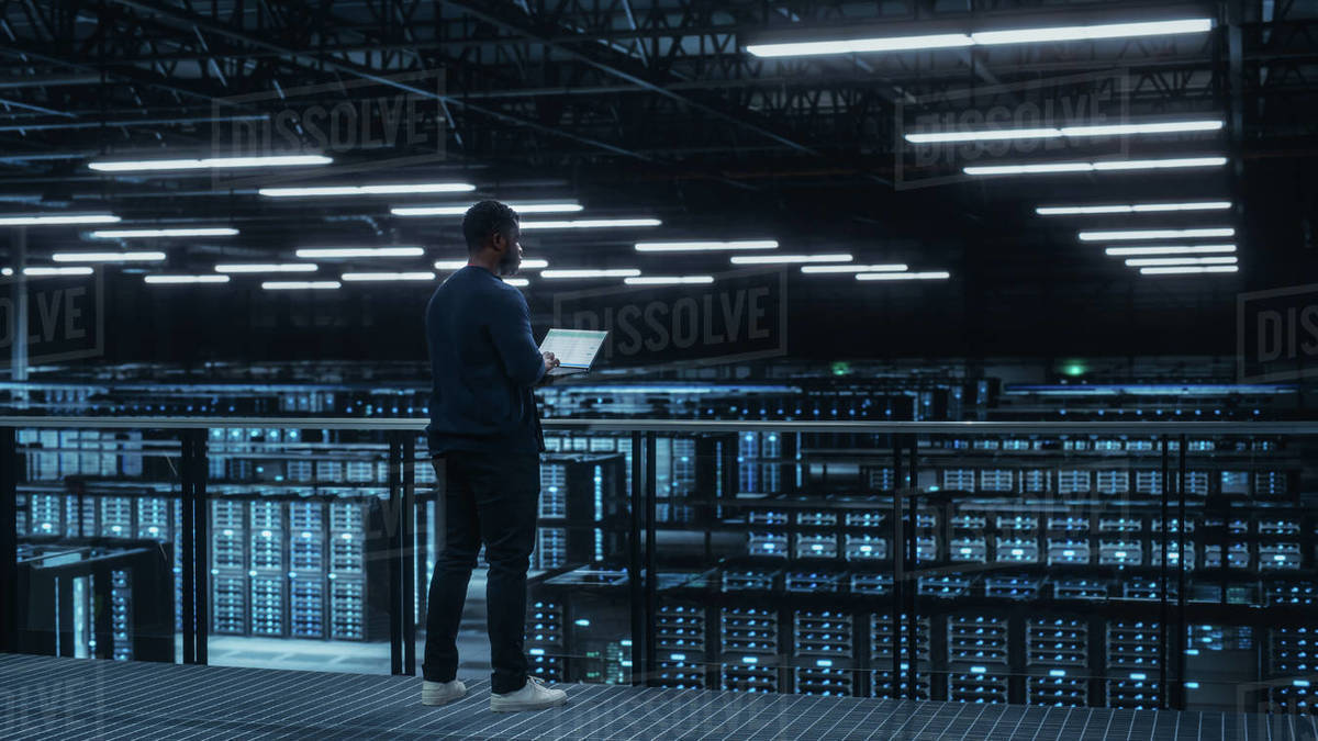 Data Center Engineer Using Laptop Computer - Royalty-free Stock Photo ...