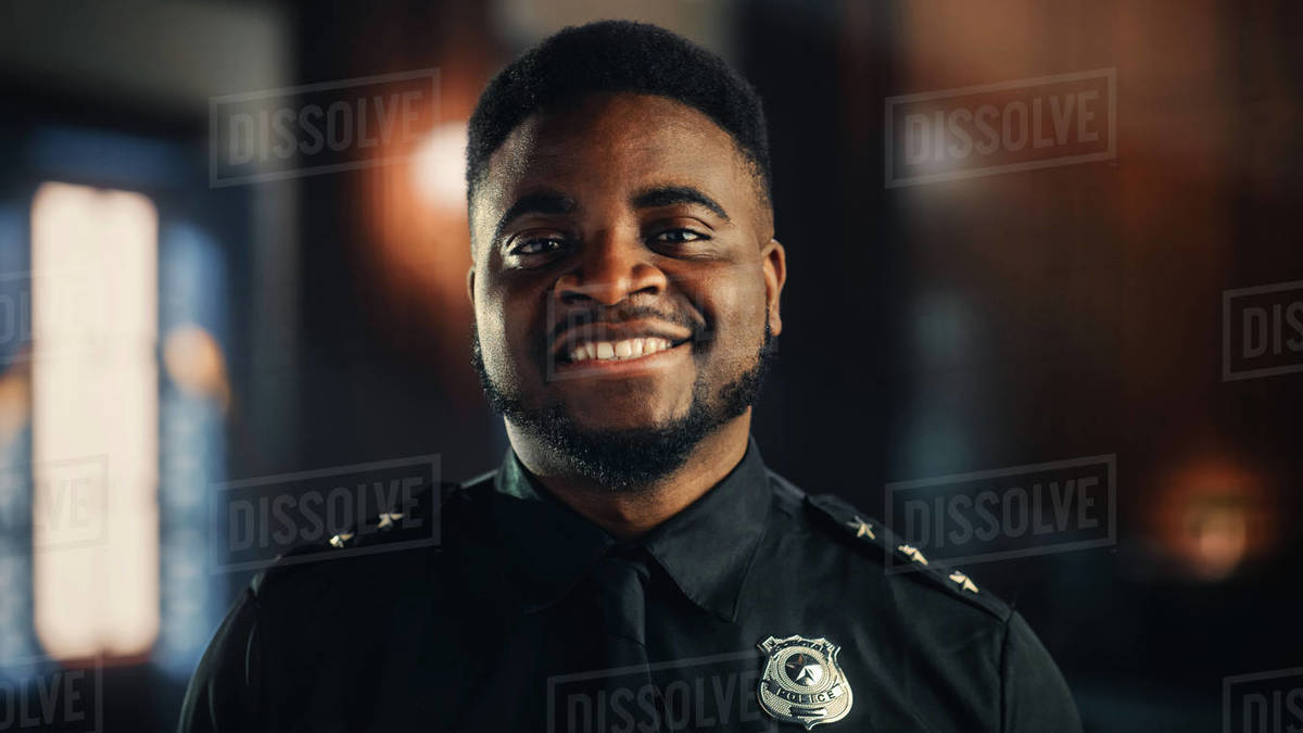 Black Policeman in Universal Uniform Smiling at Camera - Royalty-free ...