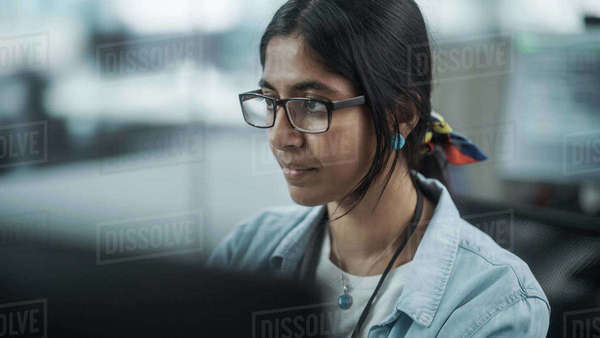 Diverse Office: Portrait of Confident Indian IT Programmer Working on ...