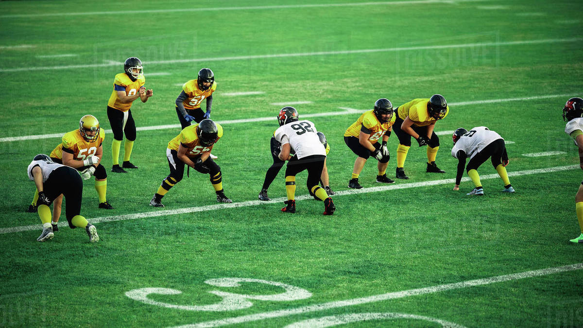 American Football Teams Start Game - Royalty-free Stock Photo | Dissolve