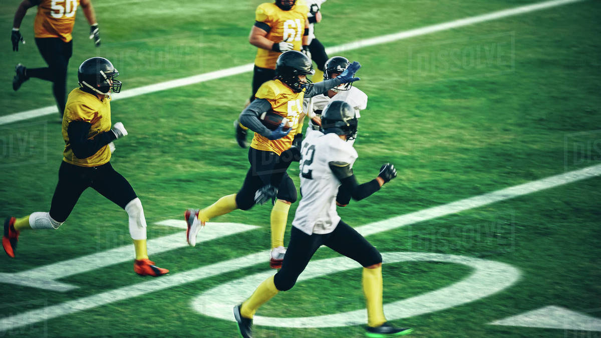 American Football Teams Start Game - Royalty-free Stock Photo | Dissolve