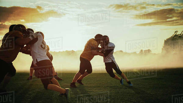 American Football Field Two Teams Compete - Stock Photo - Dissolve