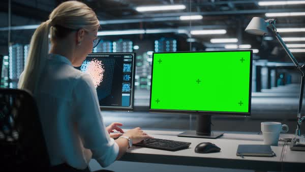 Caucasian Female IT Specialist Working on Green Screen Chroma Key ...