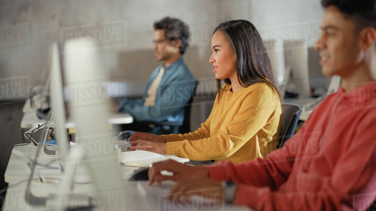 Female Student Studying in Modern University with Diverse Multiethnic ...