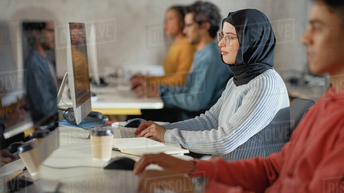 Female Student Wearing a Hijab Learning IT Programming or Computer ...
