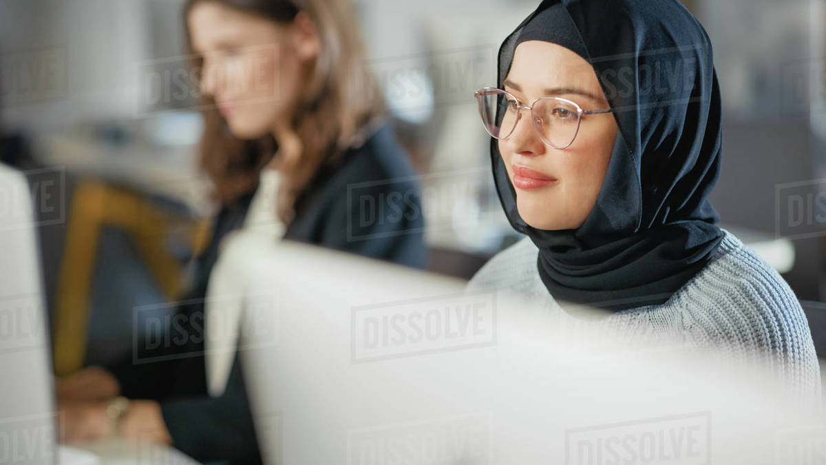 Portrait of a Female Student in Hijab Studying in University - Royalty ...