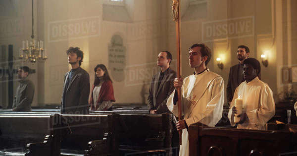 Ministers Carrying A Processional Cross, Begin The Grand Church's ...