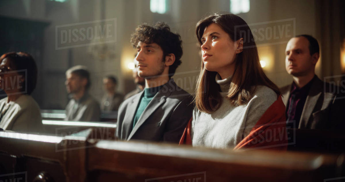 Group Of Faithful Parishioners In Grand Old Church Listening to Sermon ...